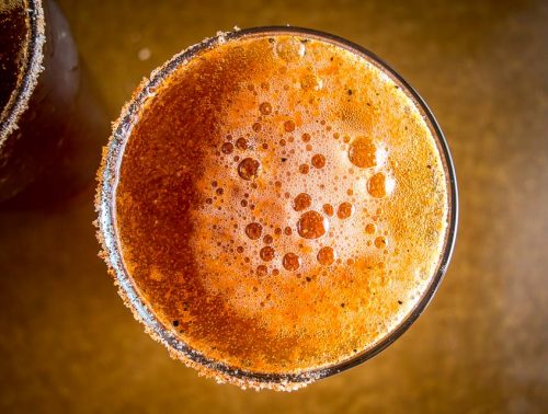 michelada salt rim on only half glass overhead | Mexican Please